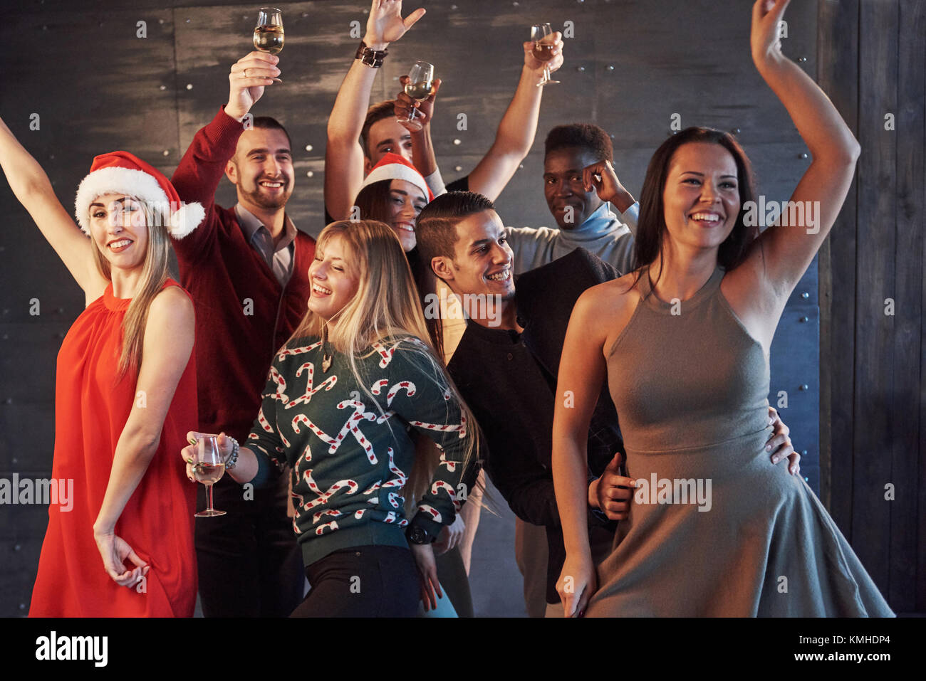 Party with friends. They love Christmas. Group of cheerful young people ...