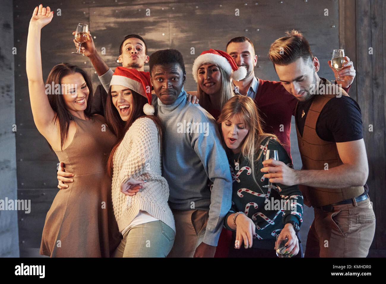 Party with friends. They love Christmas. Group of cheerful young people ...
