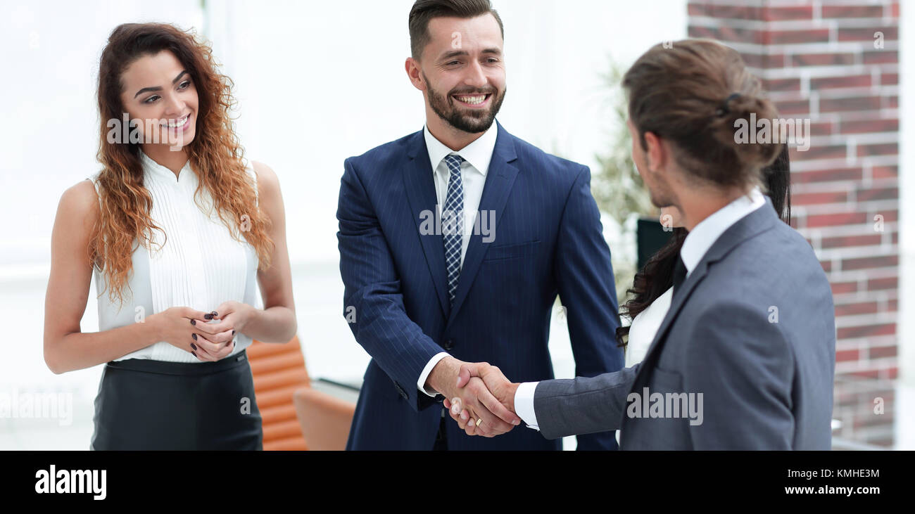 handshake business partners in the office Stock Photo - Alamy