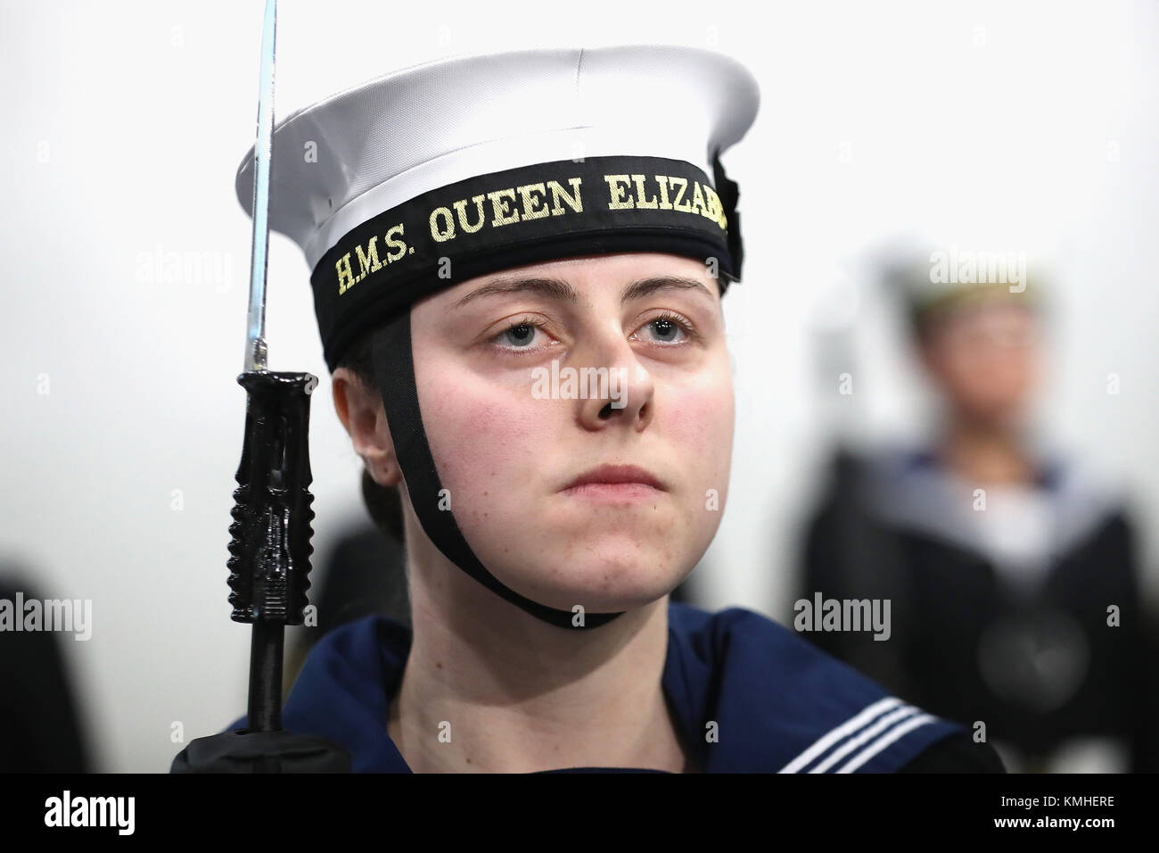 A member of the ship's company during the commissioning of HMS Queen ...