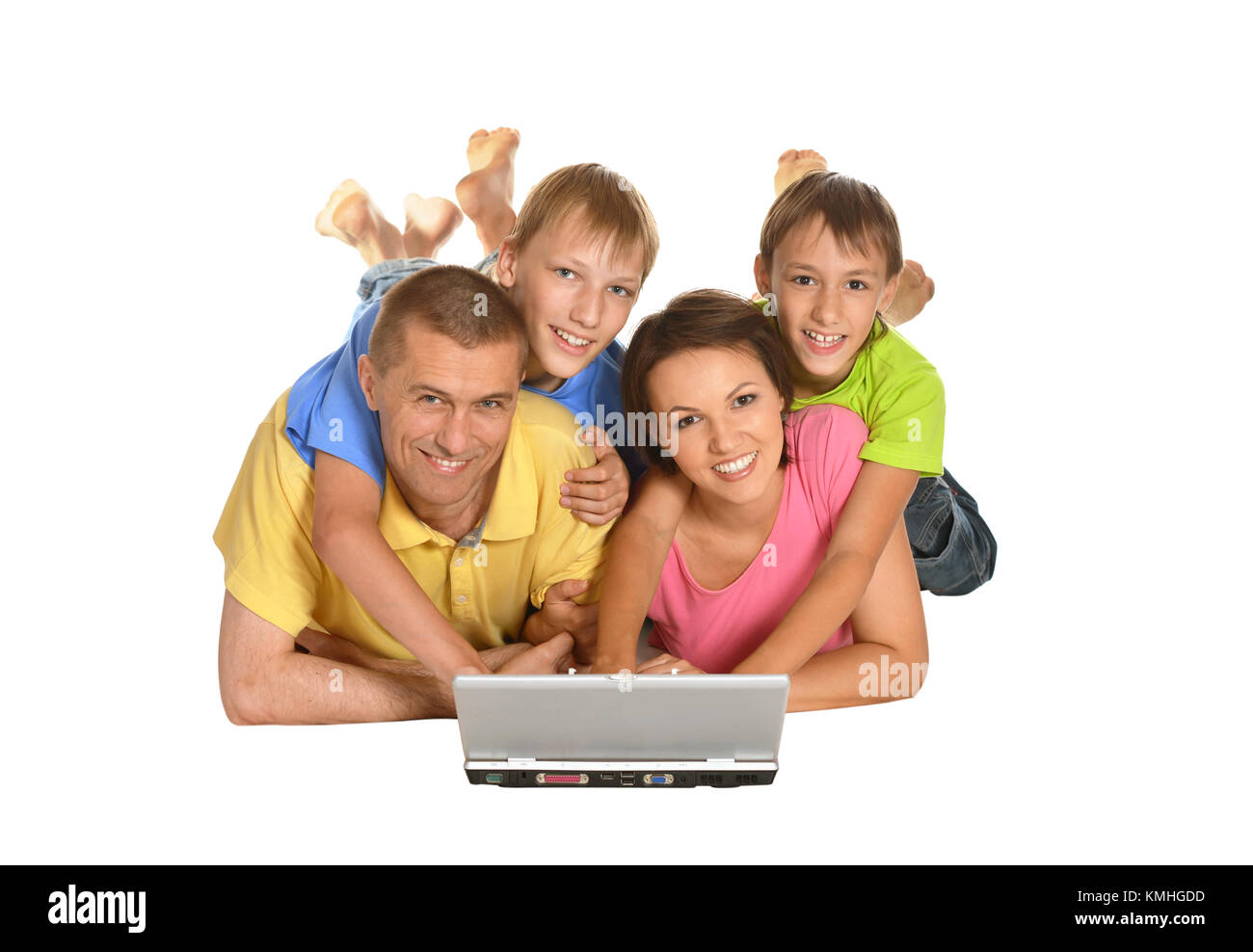 Parents with sons using laptop Stock Photo - Alamy