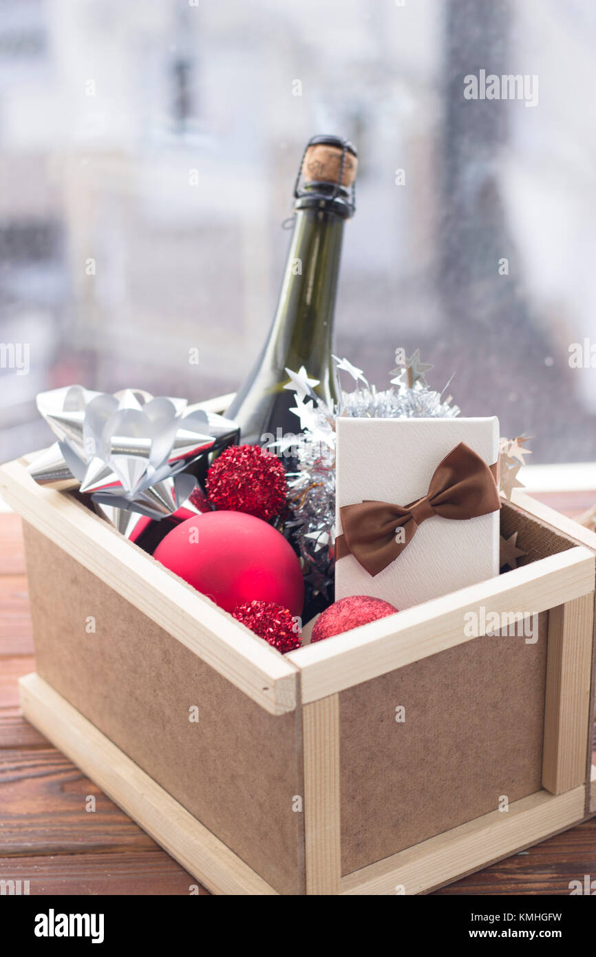 New year surprise in a box with a bottle of champagne Stock Photo - Alamy