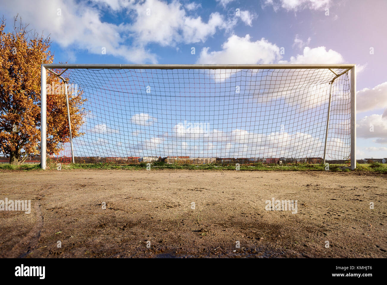 soccer goal with tree, skyline and cloudscape Stock Photo - Alamy