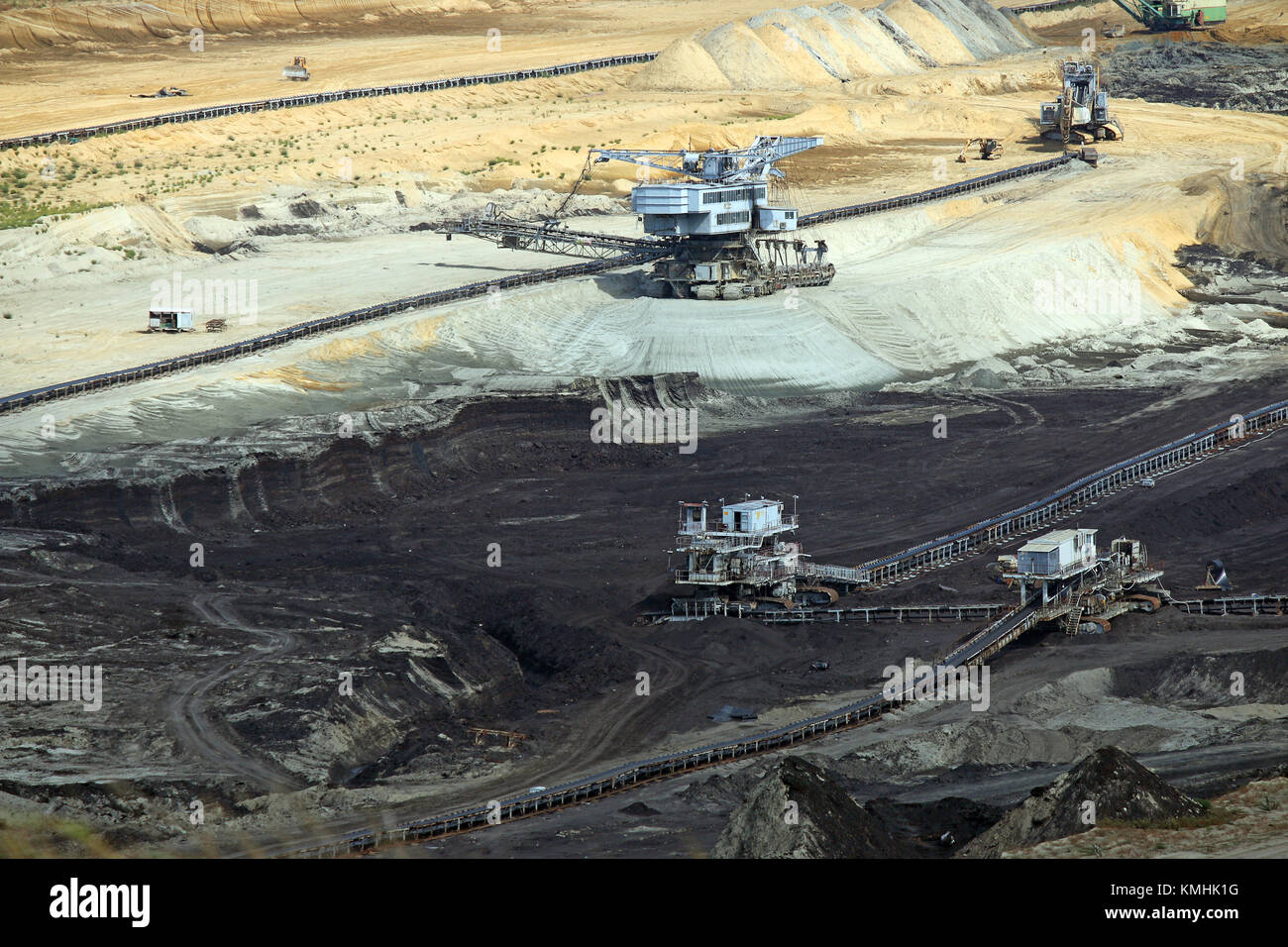 open pit coal mine with heavy machinery Stock Photo - Alamy