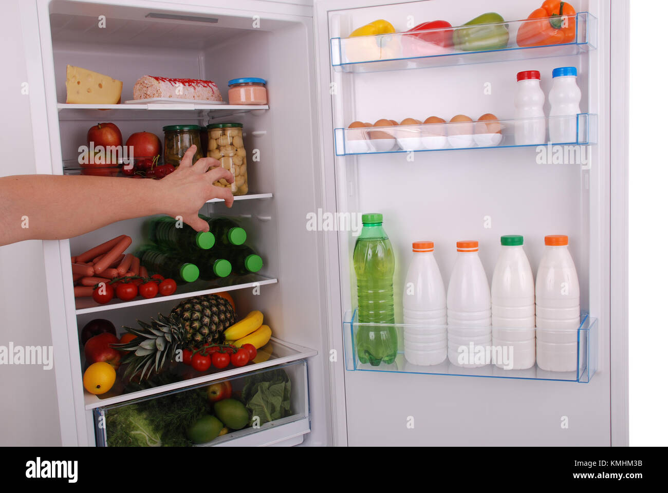 Male hand picking food from refrigerator. Full of Healthy Food Options ...