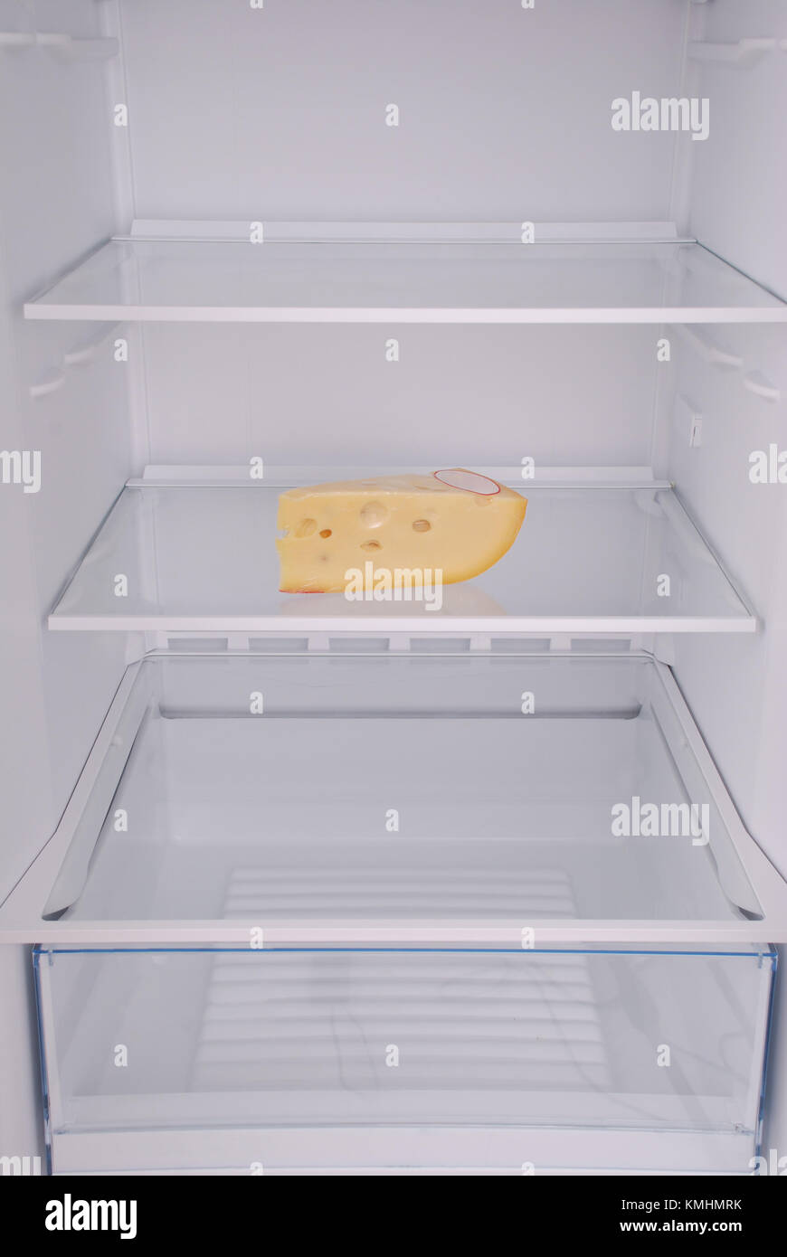 One cheese in open empty refrigerator. Weight loss diet concept Stock ...
