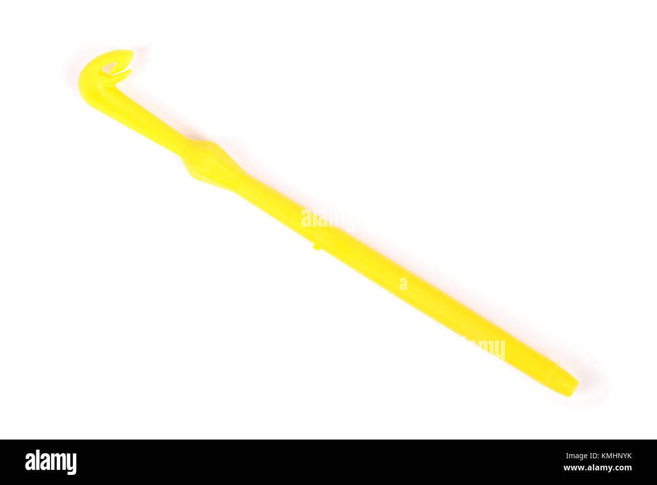 One yellow loop tier isolated on white background Stock Photo - Alamy