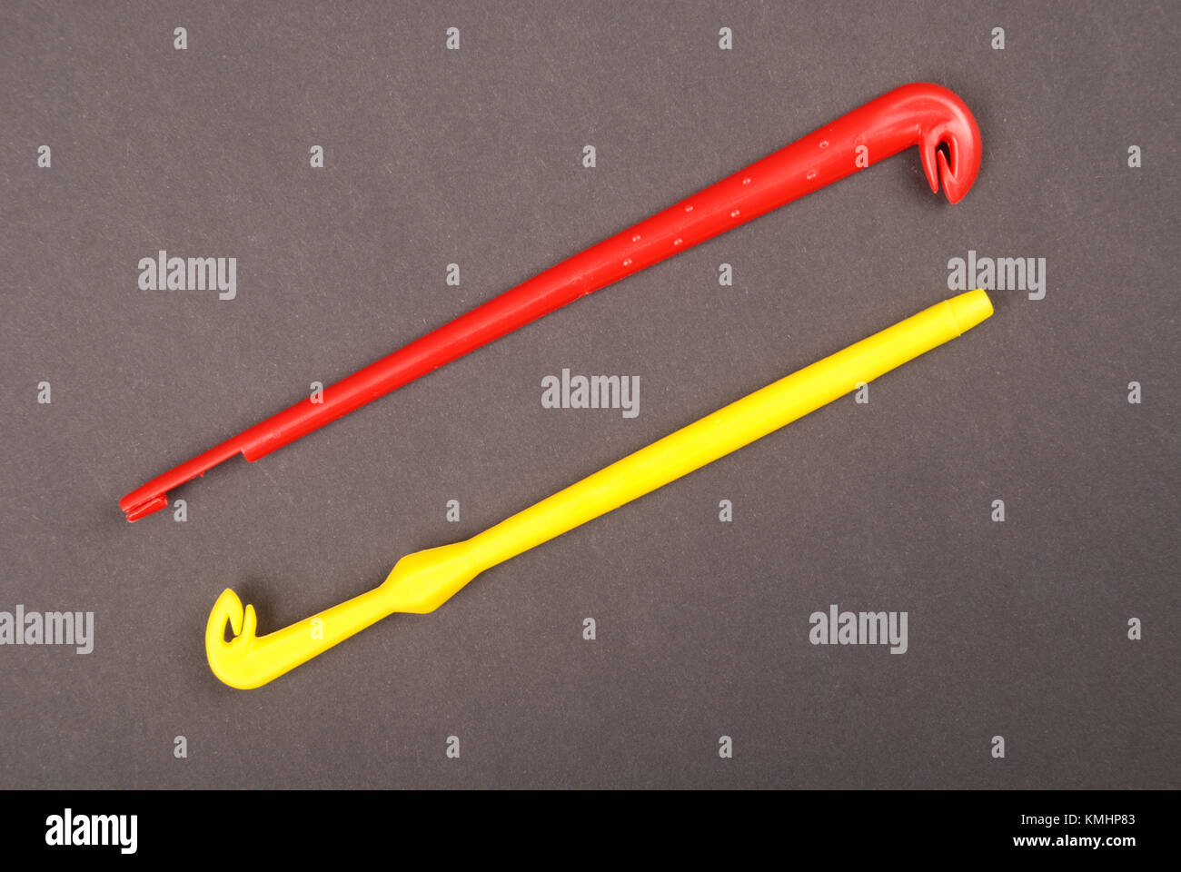 Red and yellow loop tier isolated on black background Stock Photo - Alamy