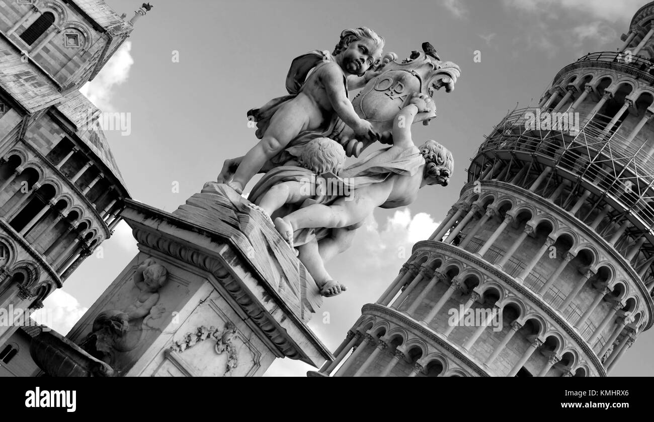 Leaning tower and statue angel in Pisa, Tuscany, Italy Stock Photo - Alamy