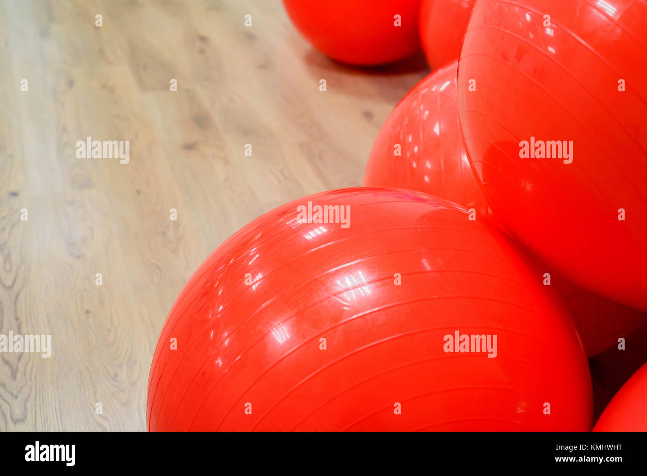 Close-up photo of red exercise ball Stock Photo - Alamy
