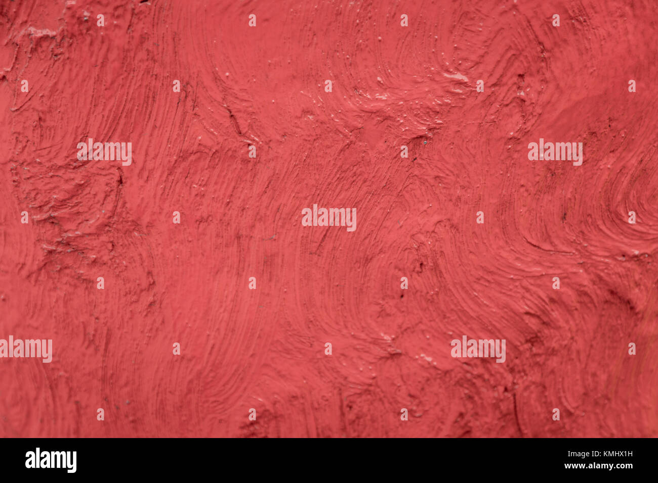 Red concrete wall on background Stock Photo - Alamy