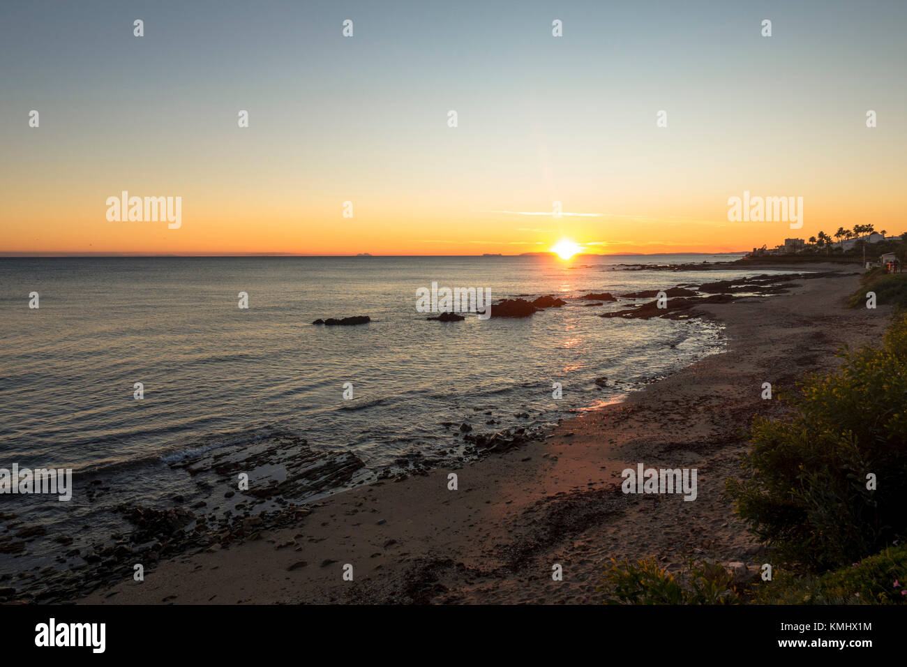 Scenic Empty beach scene at sunset, Spain Stock Photo - Alamy