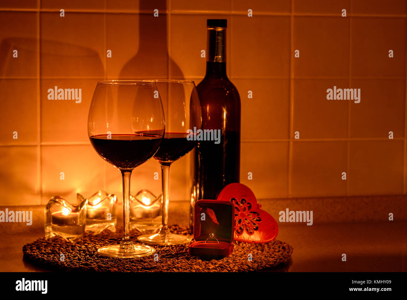 Romantic background with glasses of wine and ring Stock Photo - Alamy