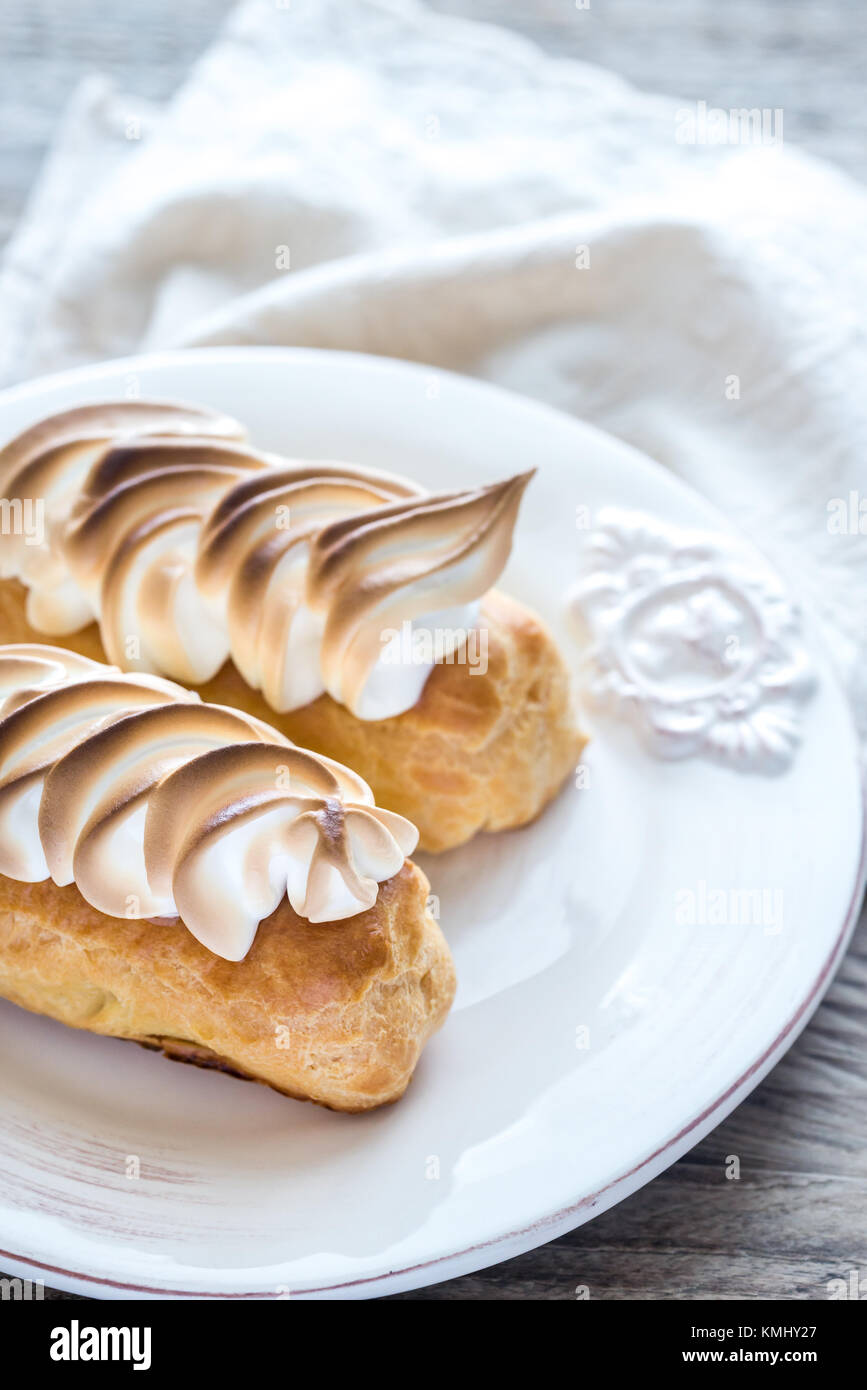 Eclairs with lemon curd and meringue Stock Photo - Alamy
