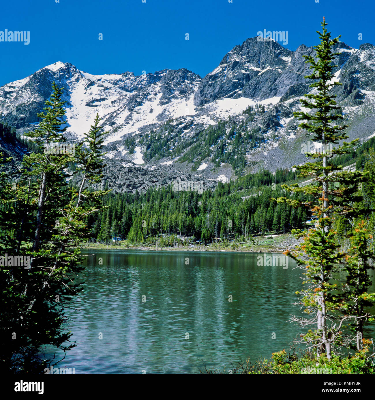 mirror lake in the spanish peaks of the madison range in the lee ...
