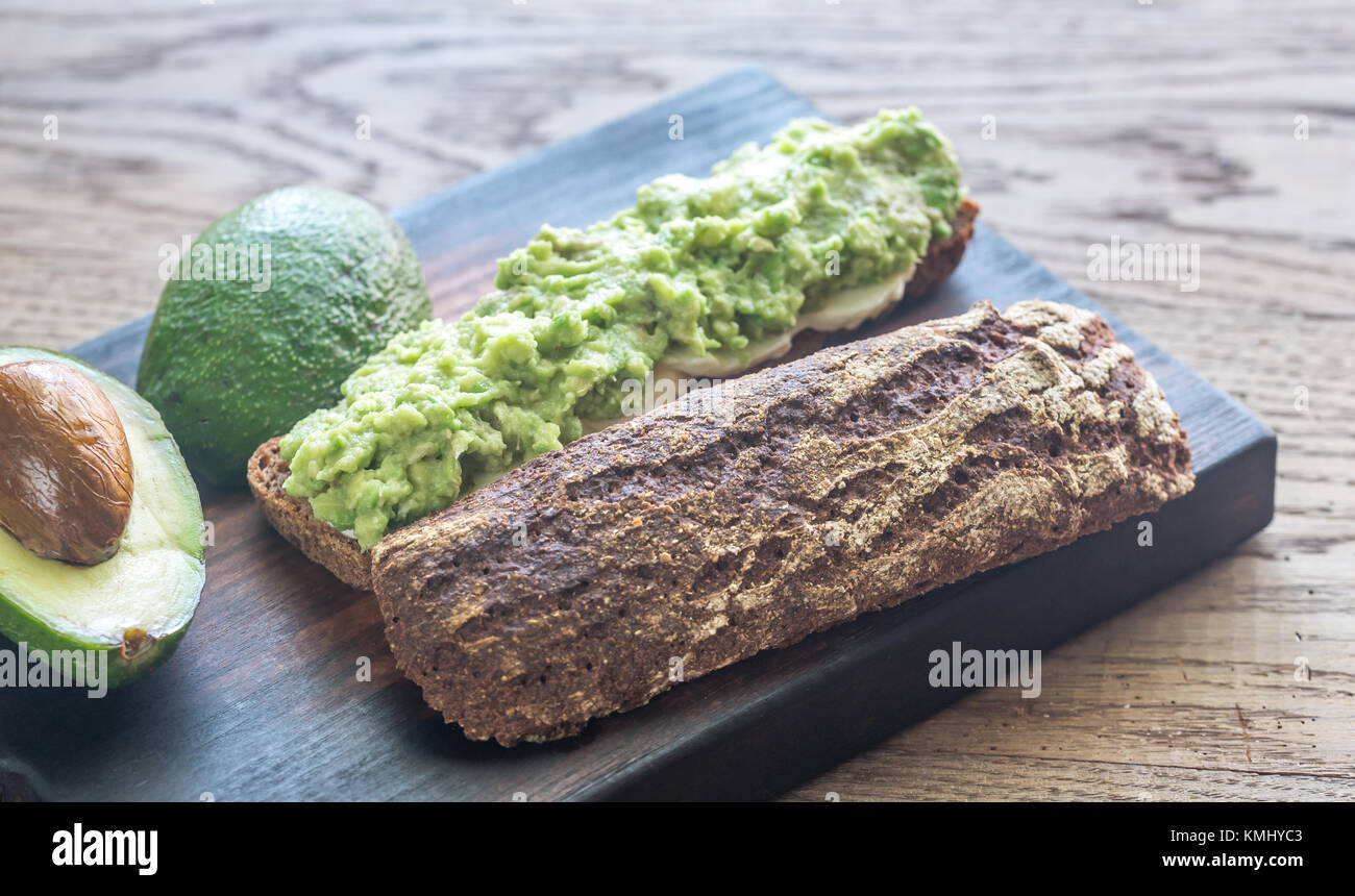 Sandwich with smashed avocado Stock Photo - Alamy