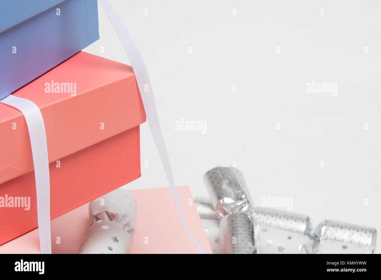 Christmas presents in gift wrap on white background in gift wrap on a ...