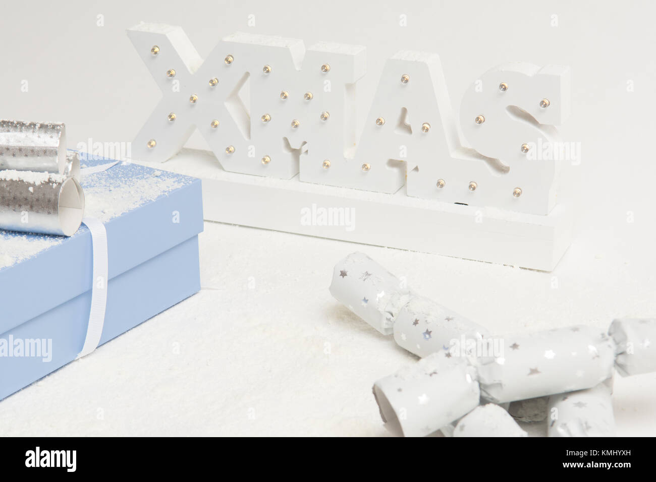 Blue Christmas present in a gift box with snow Stock Photo - Alamy