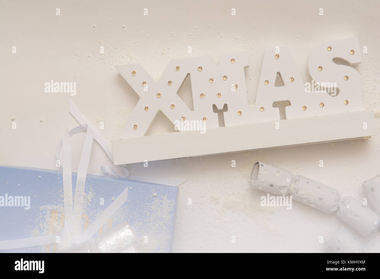 Blue Christmas present in a gift box with snow Stock Photo - Alamy