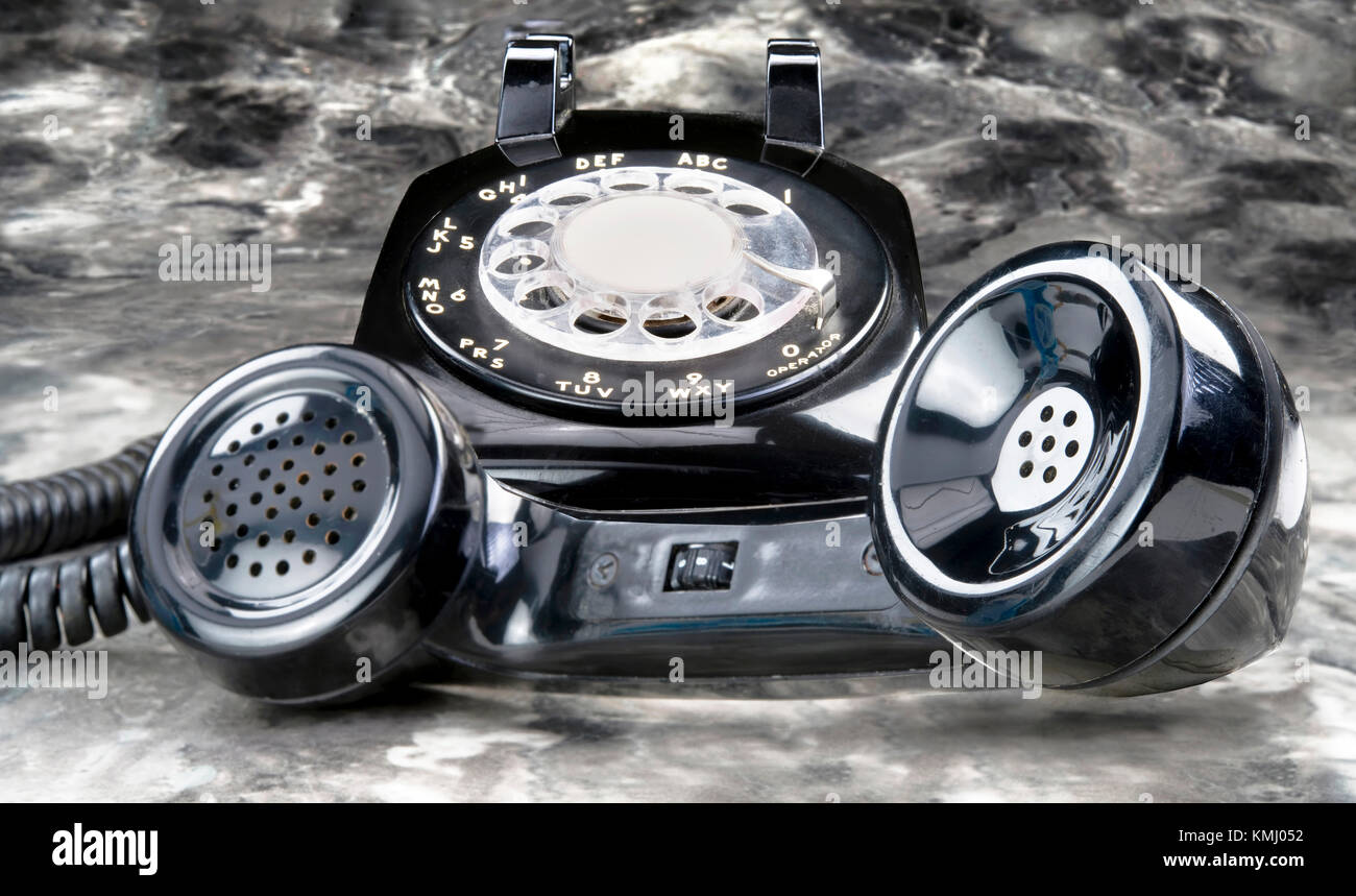 Old style black antique rotary telephone Stock Photo - Alamy
