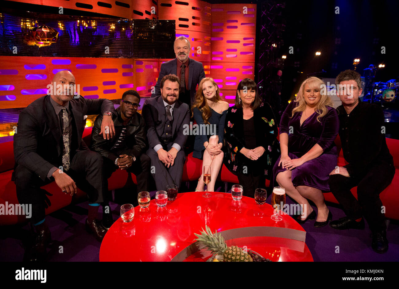 Host Graham Norton seated with (left to right) Dwayne Johnson, Kevin Hart, Jack Black, Jessica ...