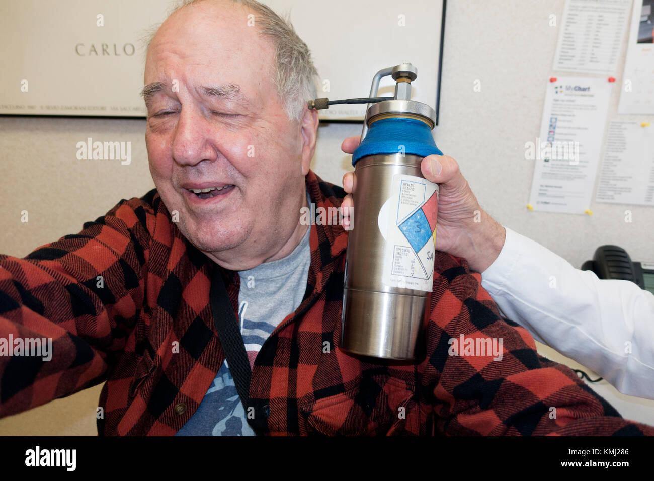 Infamous photographer Steve Skjold in the doctors office having a ...