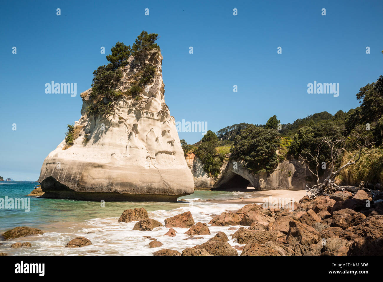 A large sea stack stands apart from the rest of the cliffs of the ...