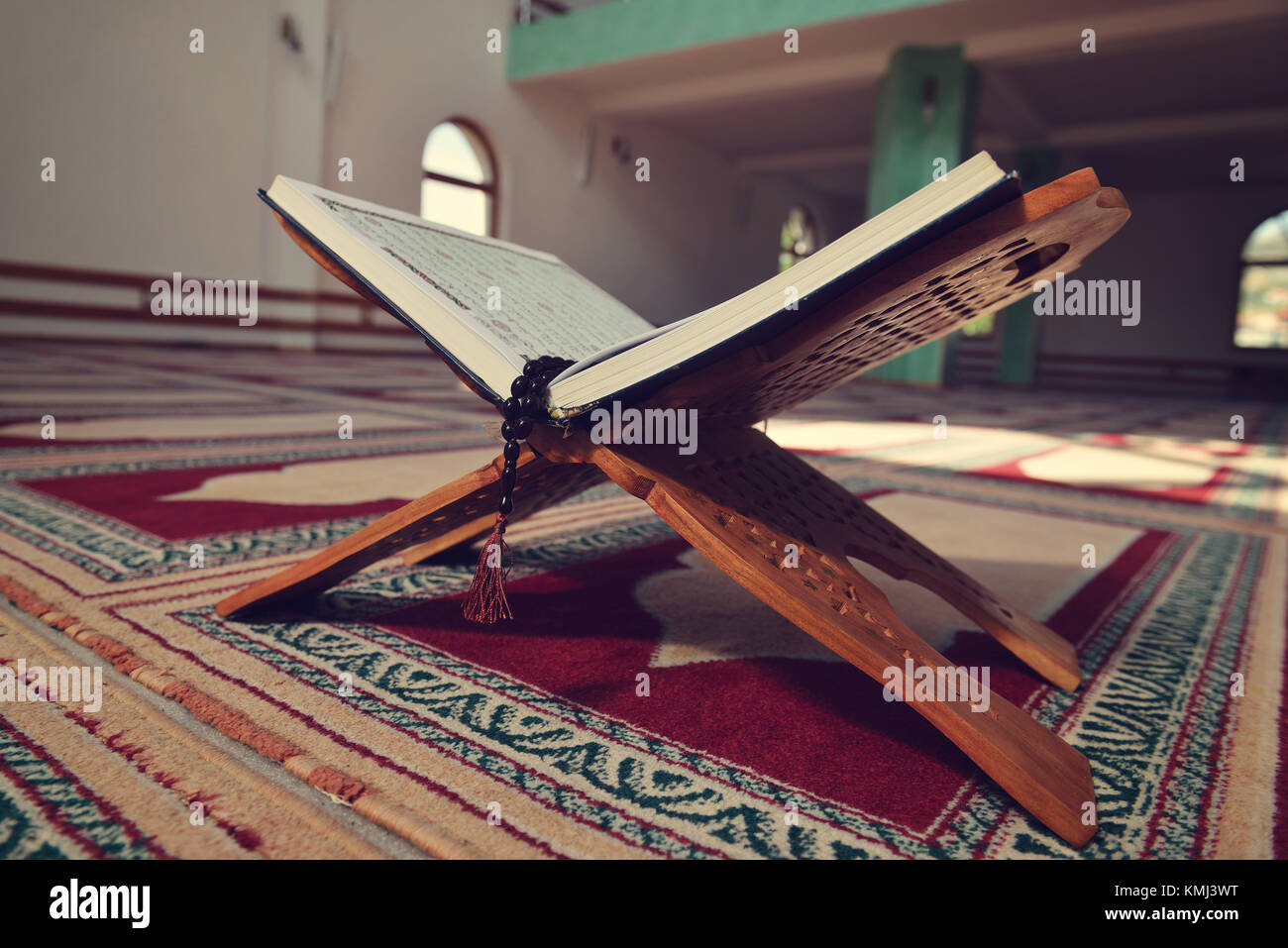 Quran in the mosque - open for prayers Stock Photo - Alamy