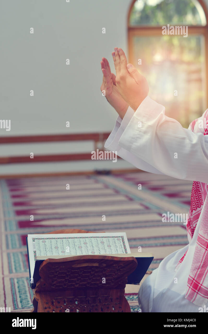 Hand of muslim people praying with mosque interior background Stock ...