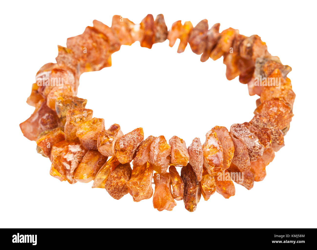 bracelet from two strings of rough amber stones isolated on white ...