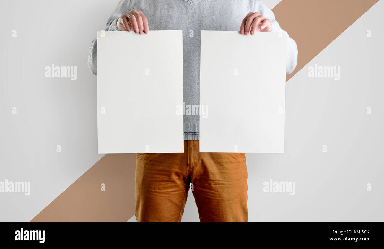 Hands holding poster template hi-res stock photography and images - Alamy
