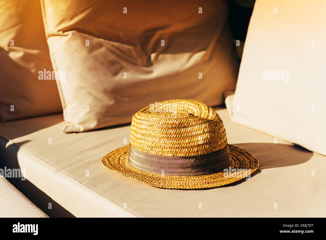 Straw hat on deck chair by the swimming pool in summer morning Stock ...