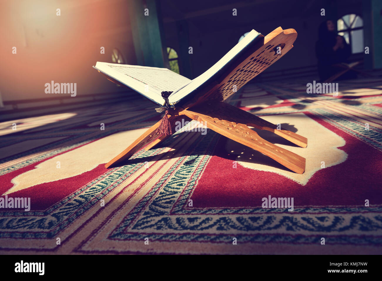 Quran in the mosque - open for prayers Stock Photo - Alamy