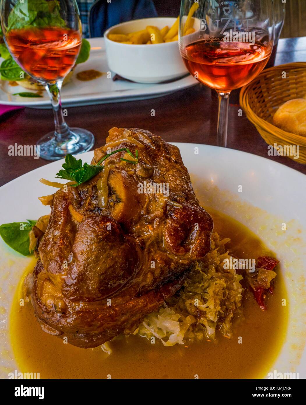 France. Food. ""Jarret de cochon"" in honey sauce Stock Photo - Alamy