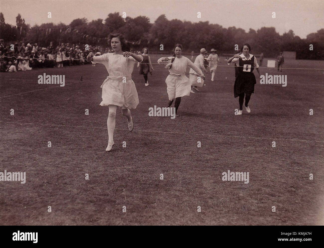 This photo captures a traditional egg-and-spoon race, a popular ...
