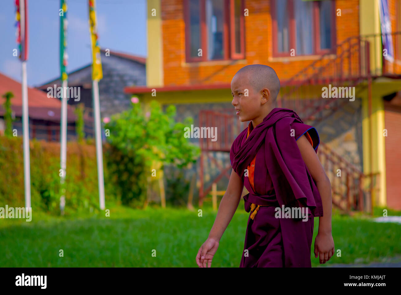 POKHARA, NEPAL - OCTOBER 06 2017: Unidentified Buddhist monk boy ...