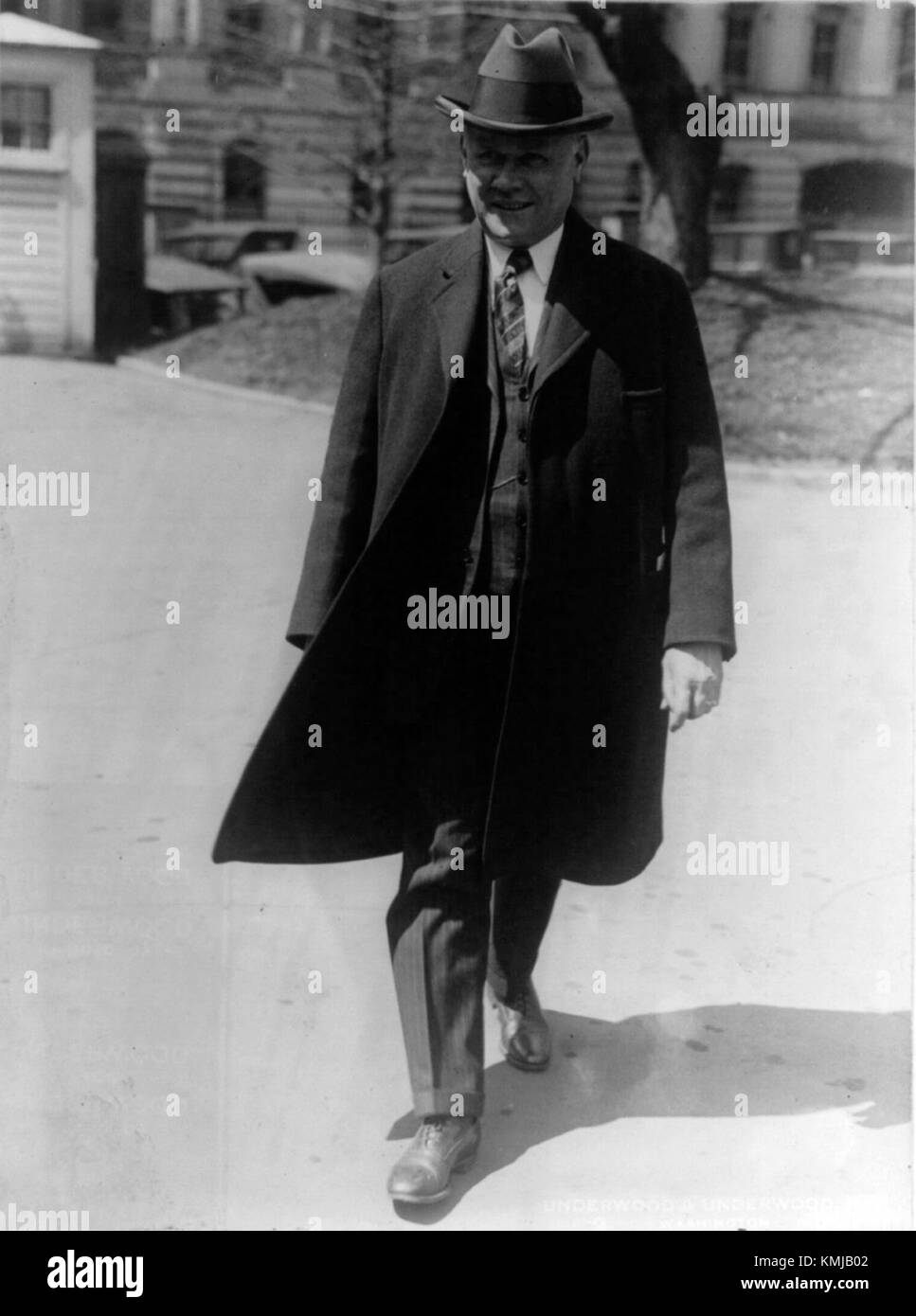 William Green, an American politician, is photographed walking. This ...