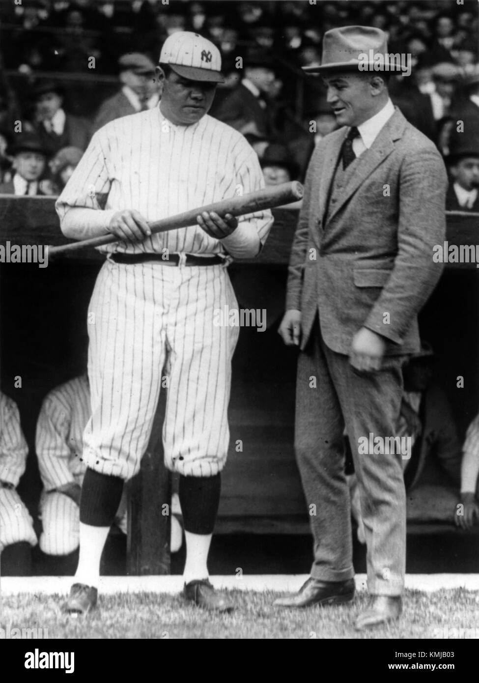 This historical photograph features baseball legend Babe Ruth alongside ...