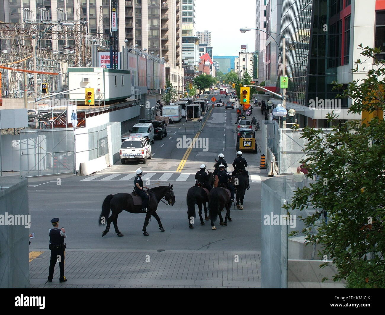 TORONTO - JUNE 23, 2010 - Police officers marching on the streets on ...