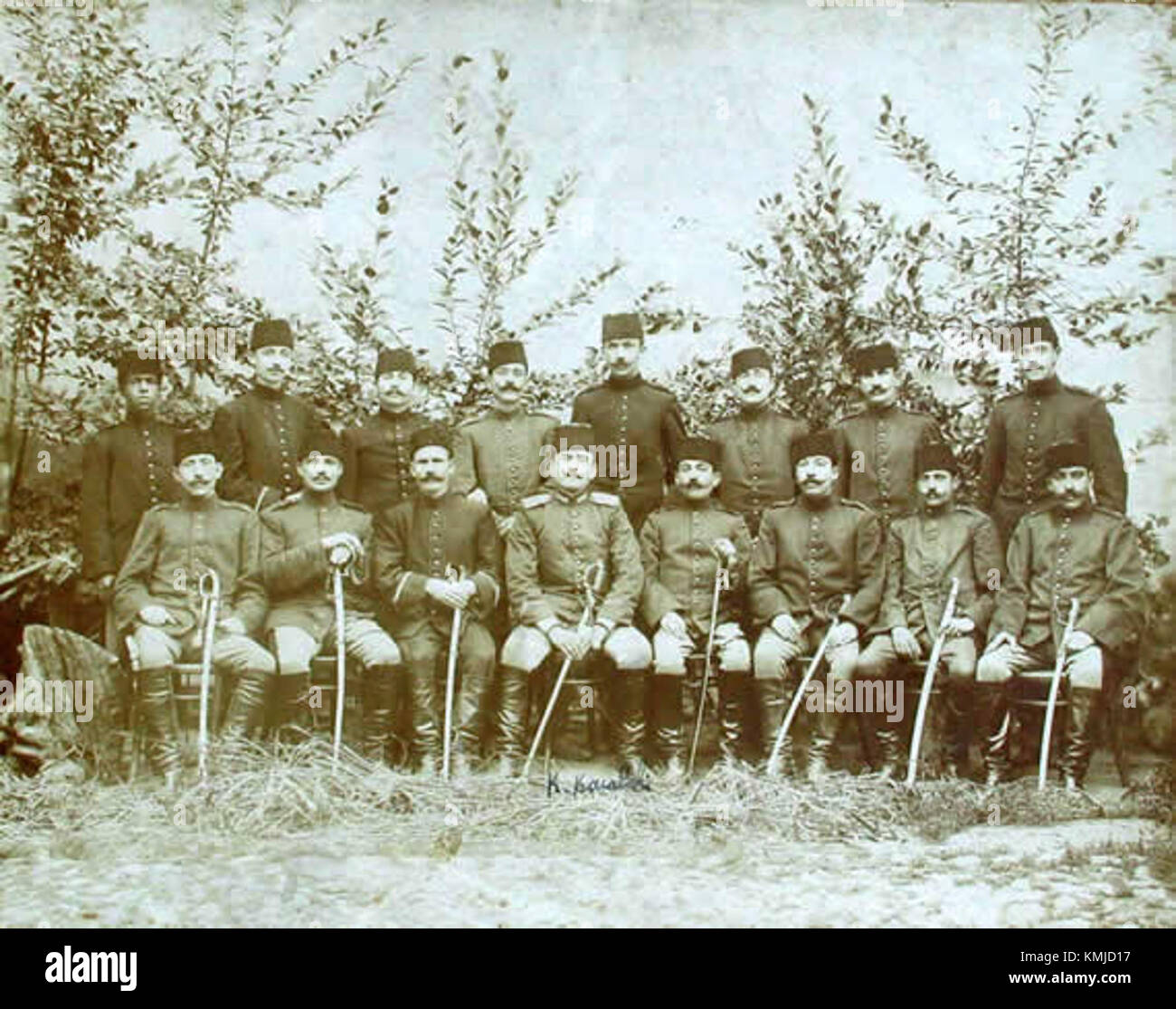 This historical photograph shows Ottoman officers and soldiers ...