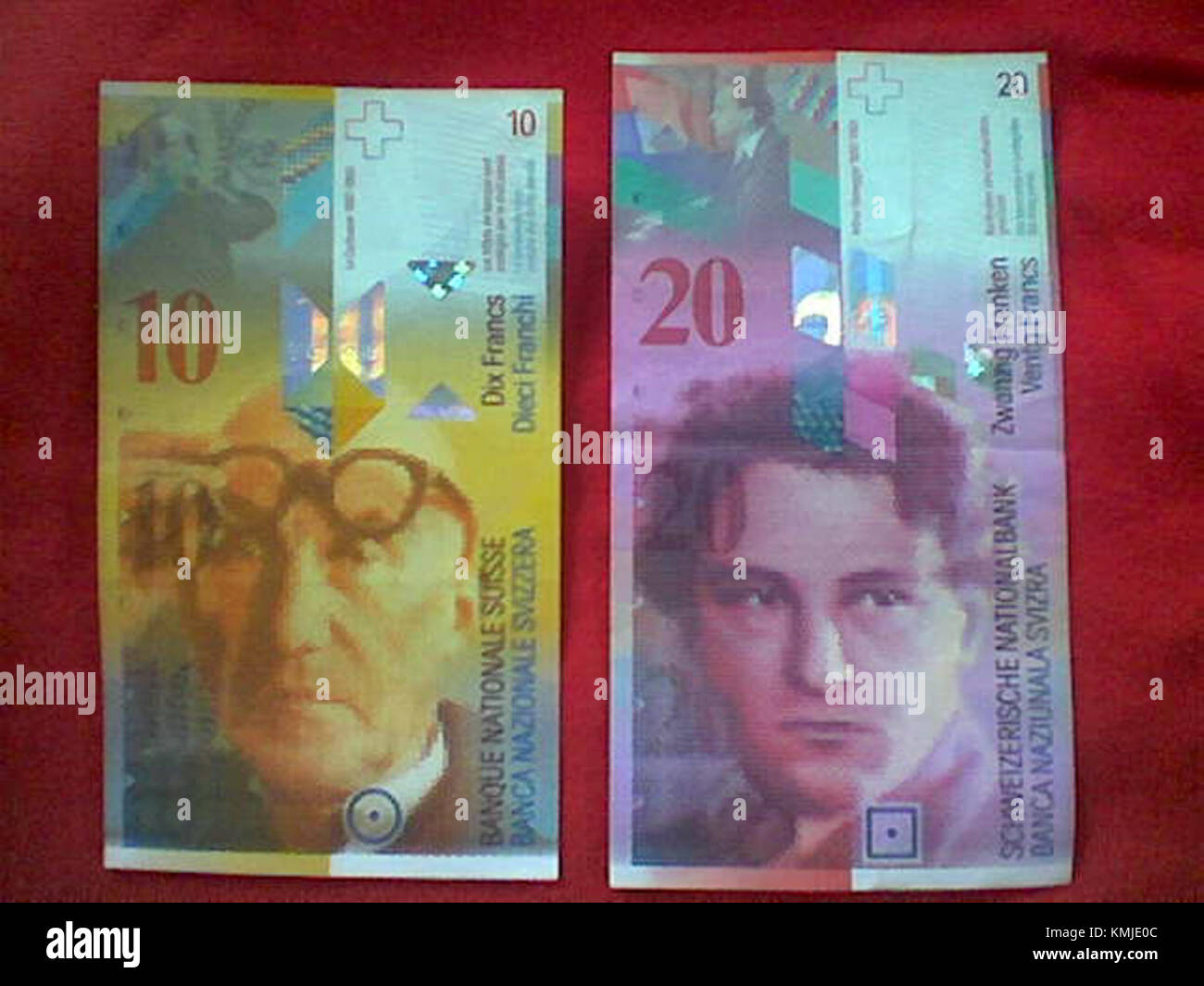 This image features Swiss currency, specifically the 10 and 20 Swiss ...