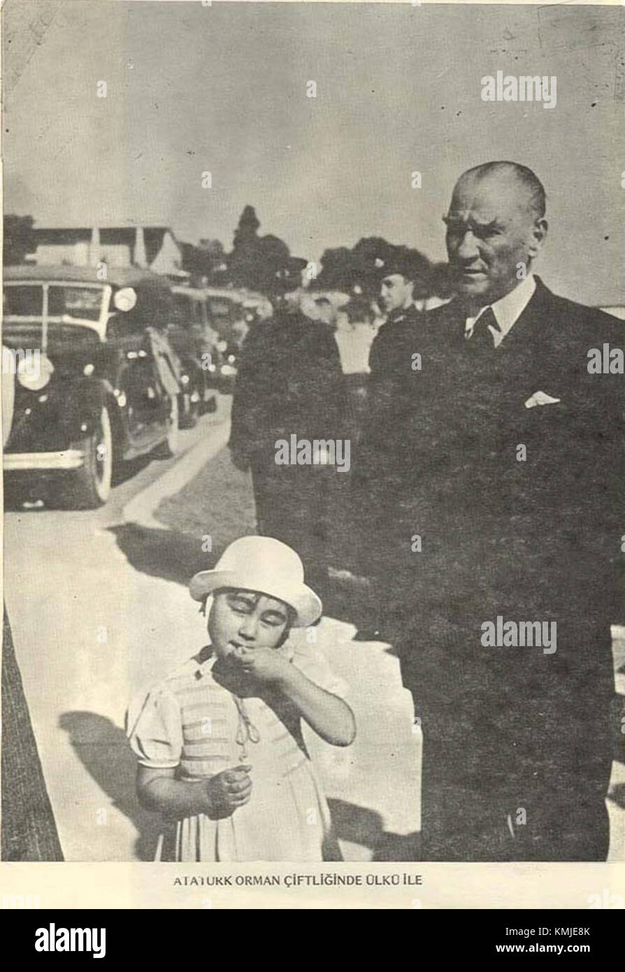 A photo depicting Ataturk, Ulku, and a child, capturing a moment of ...