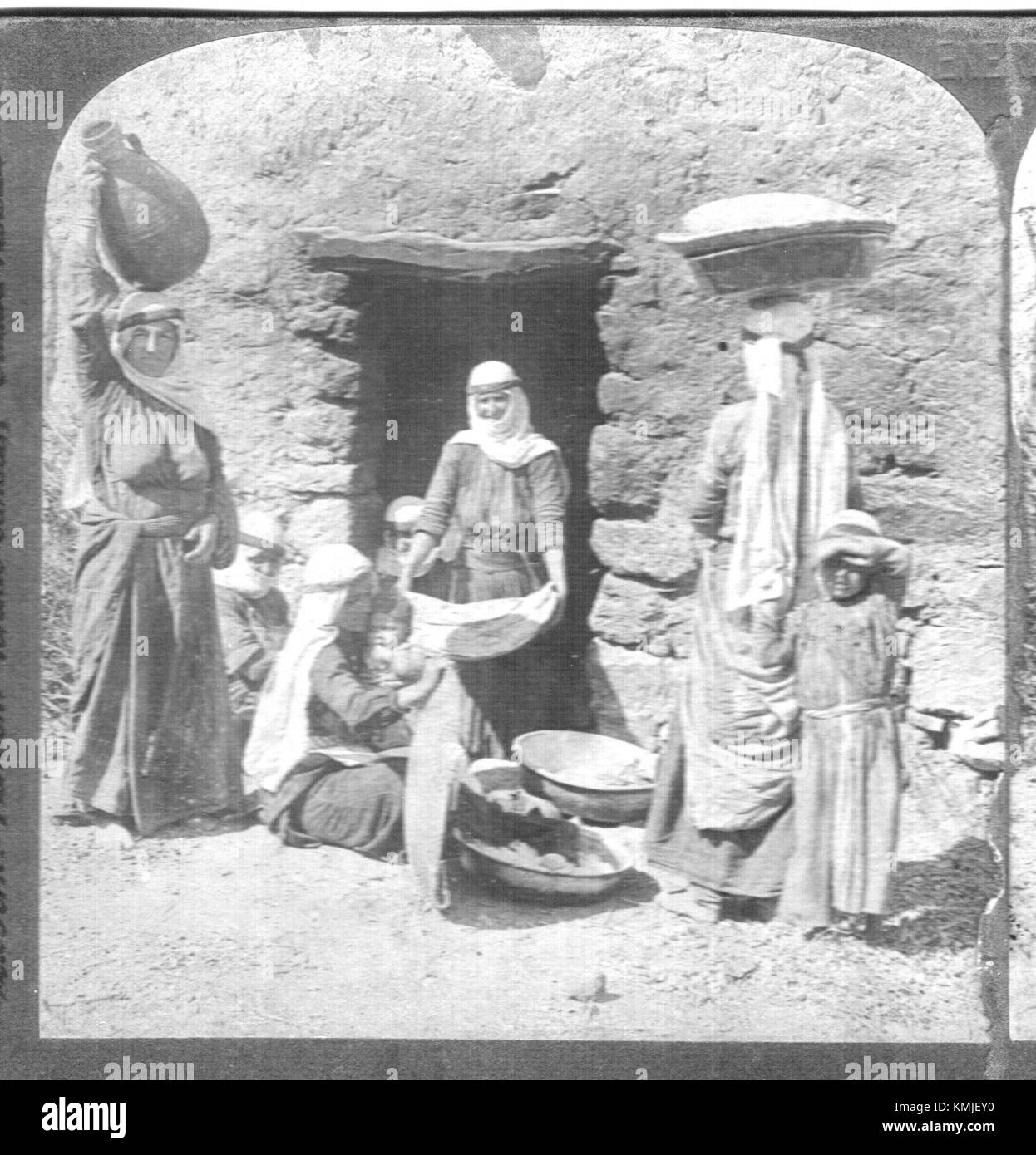 This historical photograph from around 1880 shows Druse women at a ...