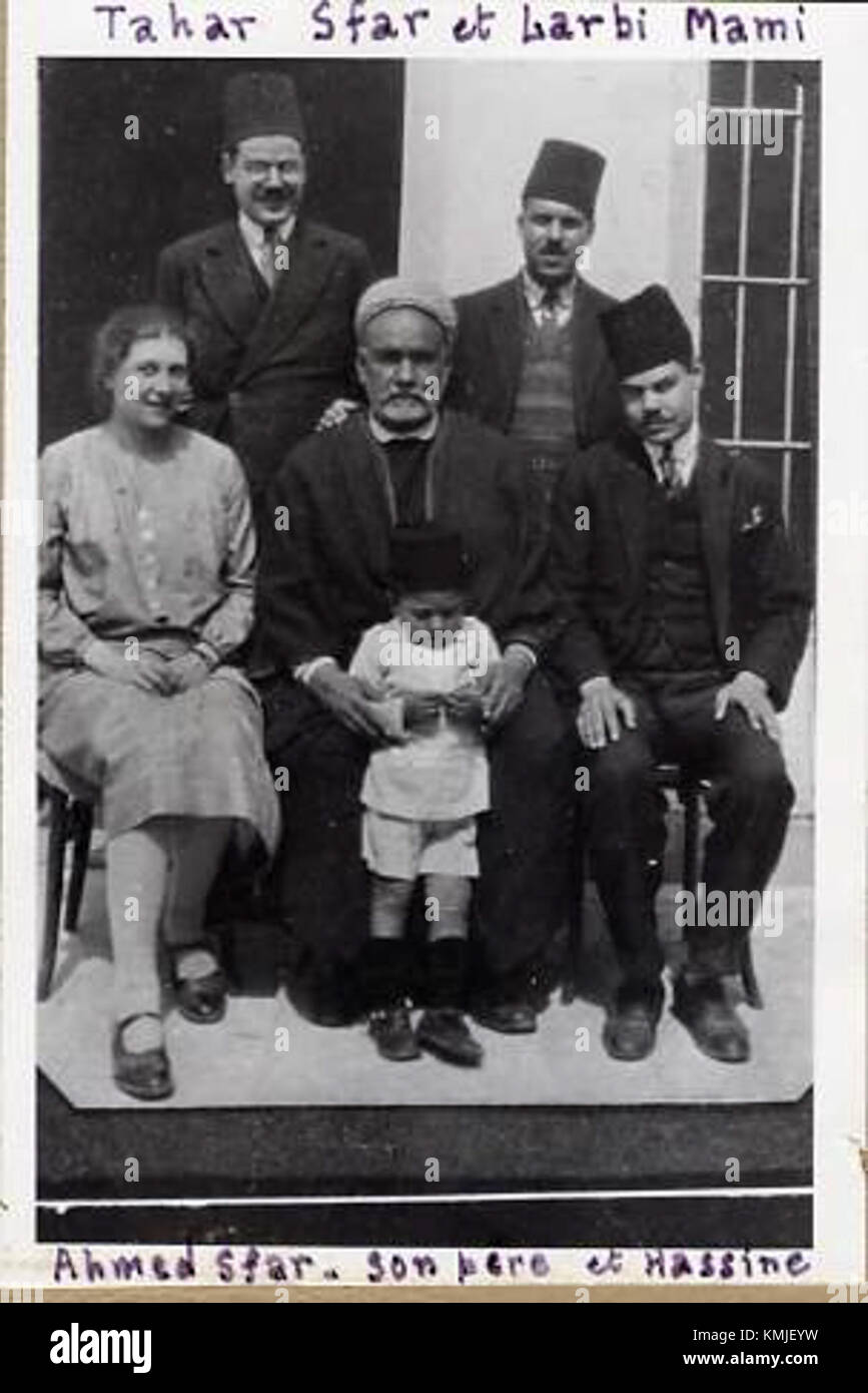 This image features the family portrait of the Sfarinconnu family, an ...