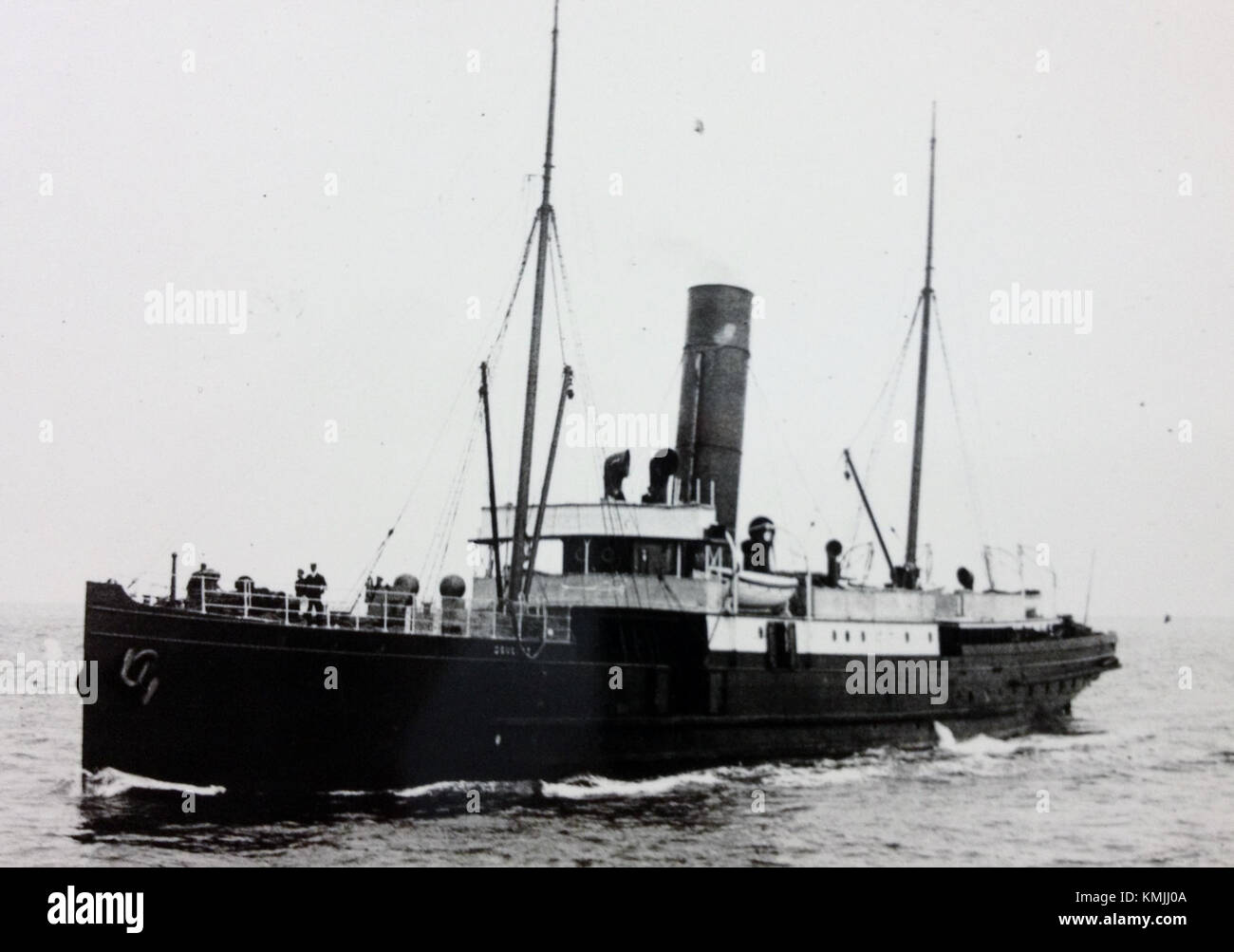 A photograph capturing the SS Douglas, a passenger ship, nearing its ...