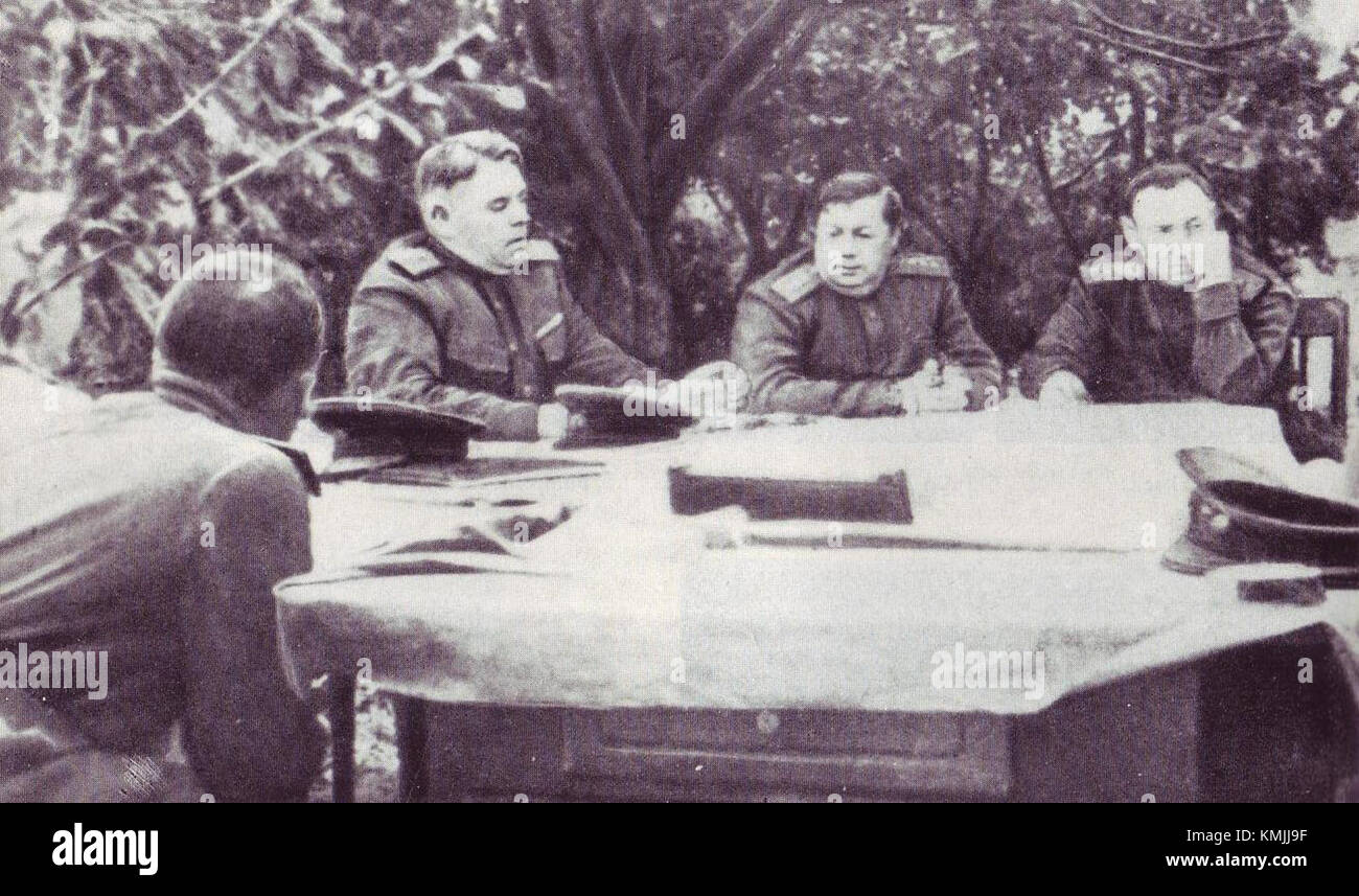 A historical photograph capturing the 1943 meeting between Soviet ...