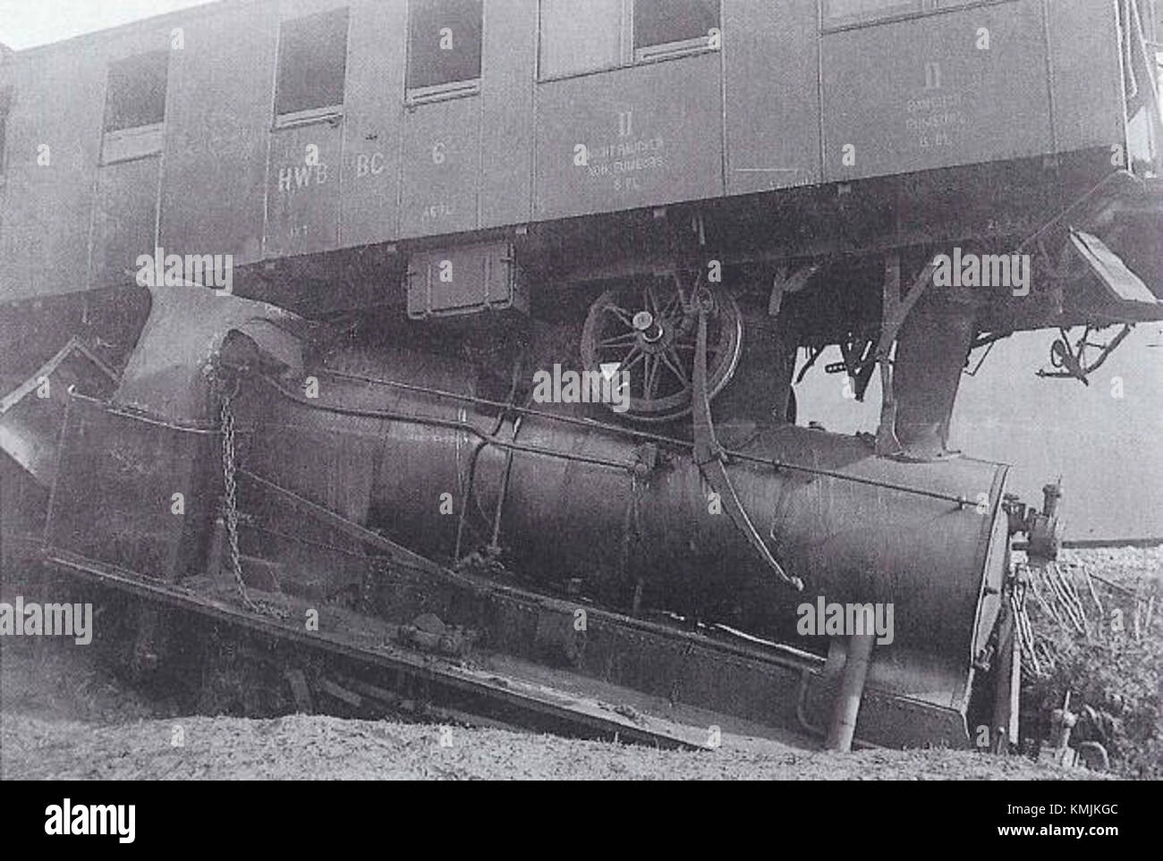 A historical photograph of a train accident at Willisau, depicting the ...