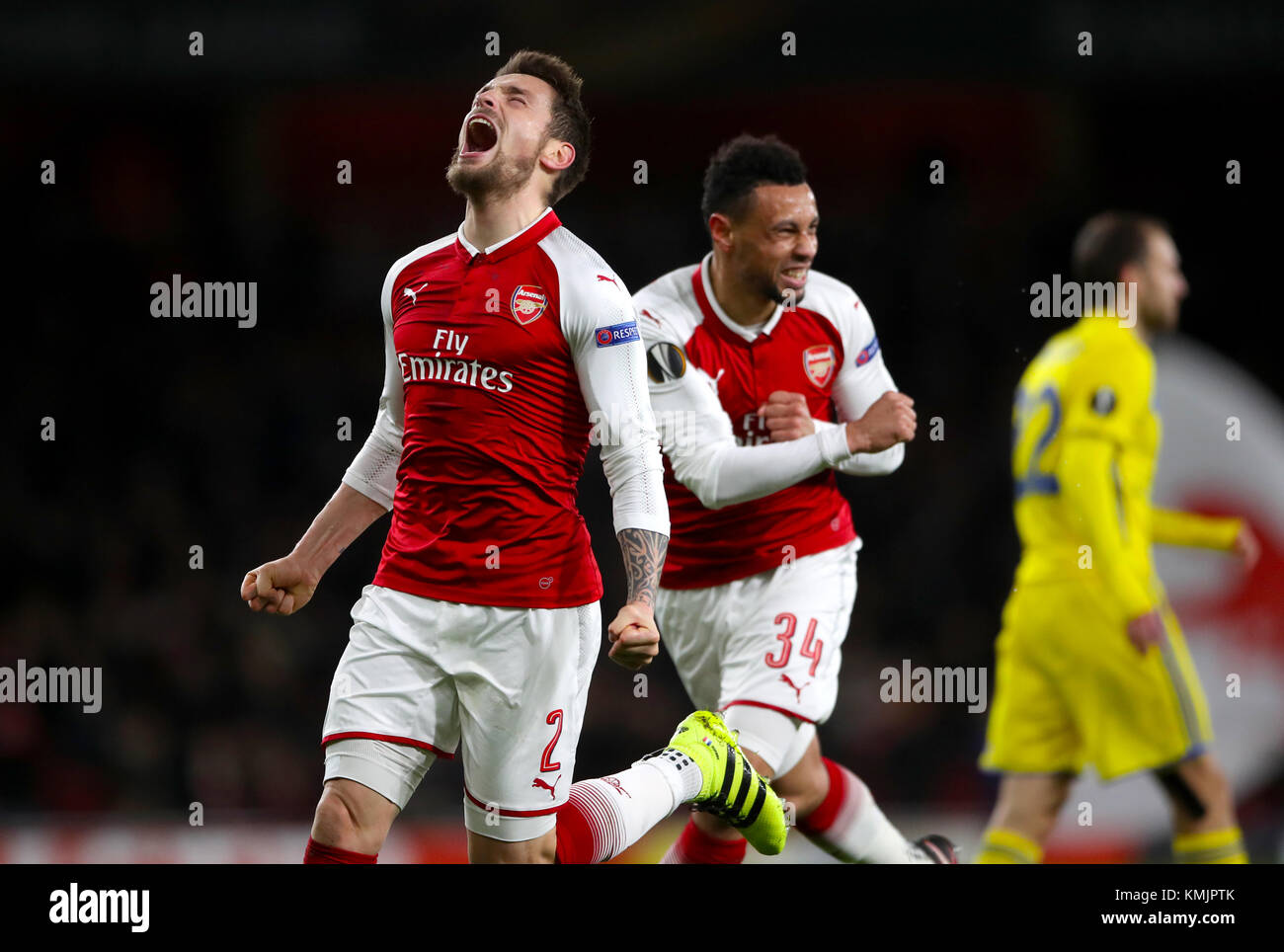 Arsenals mathieu debuchy celebrates scoring hi-res stock photography ...