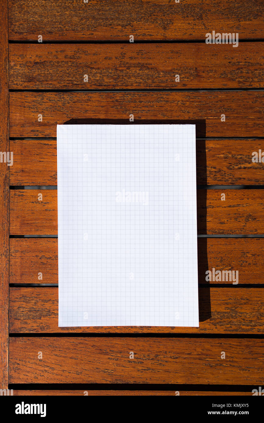 Empty blank rectangular white simple notepad with a shadow outdoor on ...