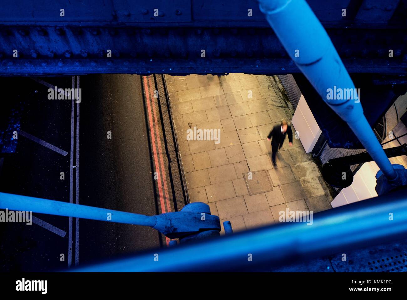 Silhouette man walking under bridge hi-res stock photography and images ...